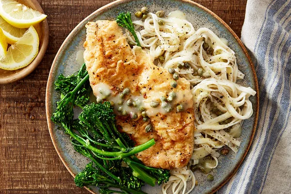 Pan-seared tilapia piccata over linguine with baby broccoli | Sunbasket