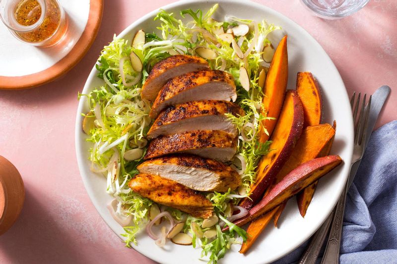 Paprika-Spiced Chicken with Frisee Salad and Sweet Potato Wedges ...